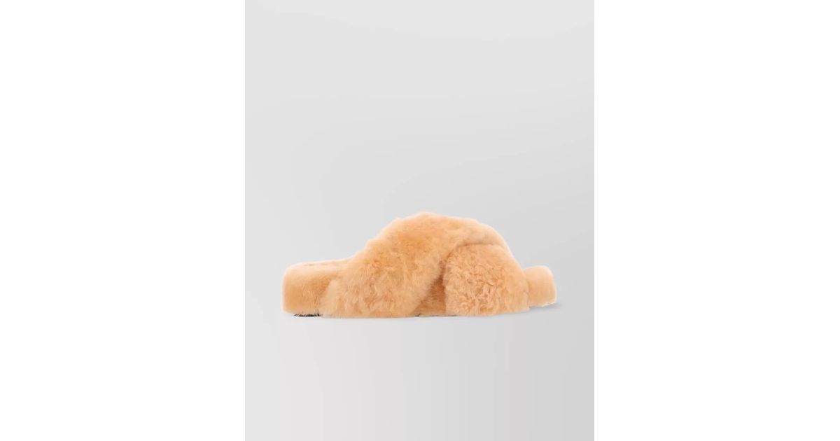 Jil Sander Comfortable Shearling Slides With A Playful Touch in Natural ...
