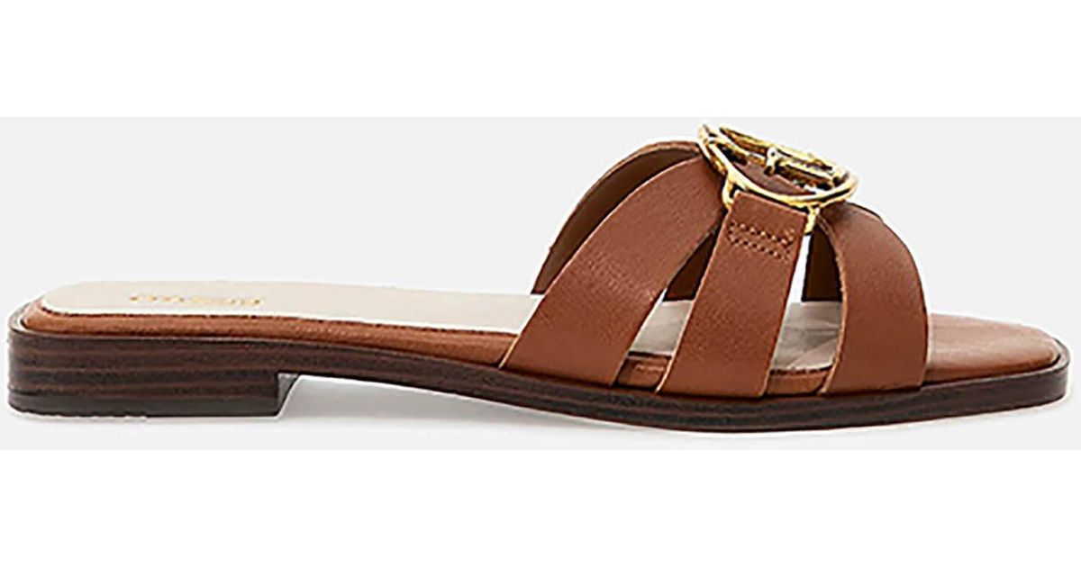 Guess Symo Gold Logo Plaque Leather Mules in Brown | Lyst