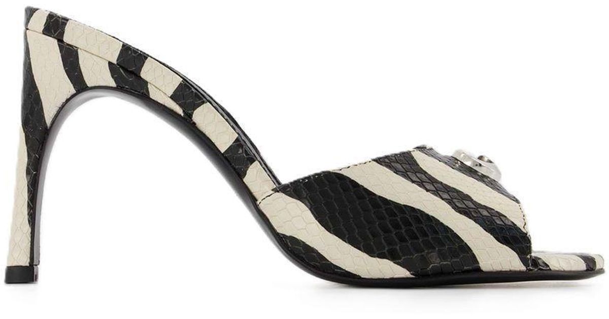Coperni Zebra Print Logo Mules in Metallic | Lyst