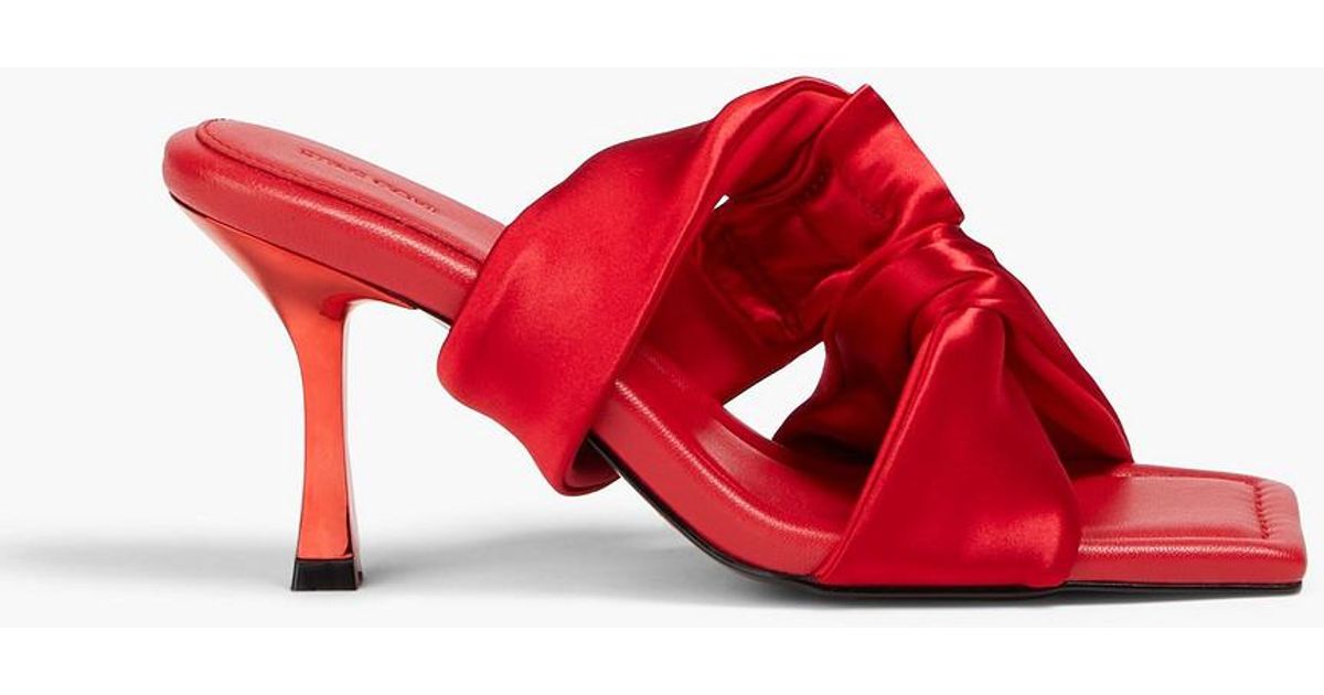 Stine Goya Jet Set Twisted Satin Mules in Red | Lyst UK
