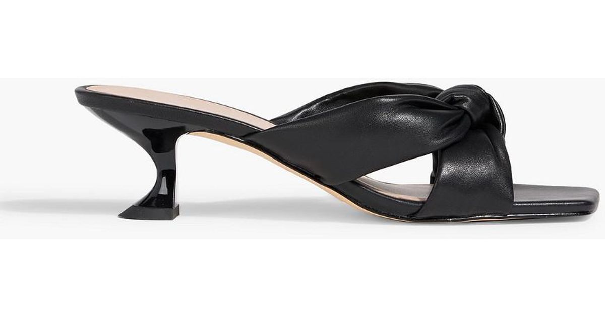 Stuart Weitzman Playa 50 Knotted Padded Leather Mules in Black | Lyst