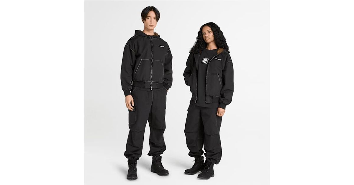Timberland All Gender Washed Duck Canvas Hooded Bomber in Black | Lyst UK