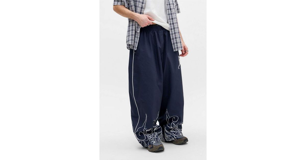 Ed Hardy Uo Exclusive Navy Print Nylon Track Pants in Blue for Men ...