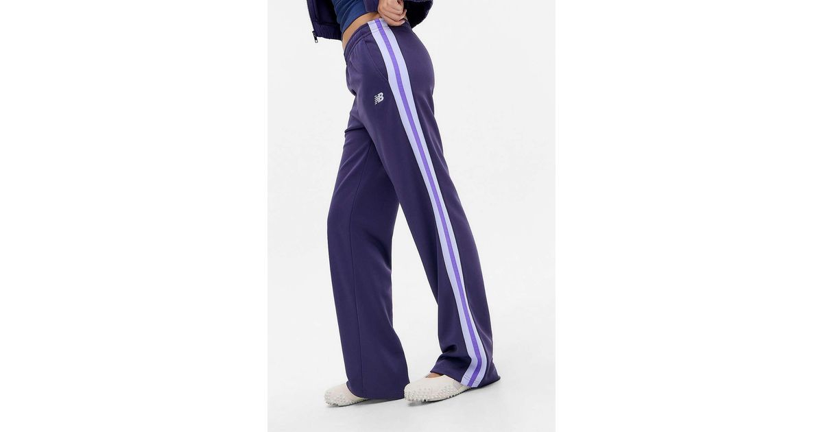New Balance Interlock Taped Track Pants in Blue | Lyst UK