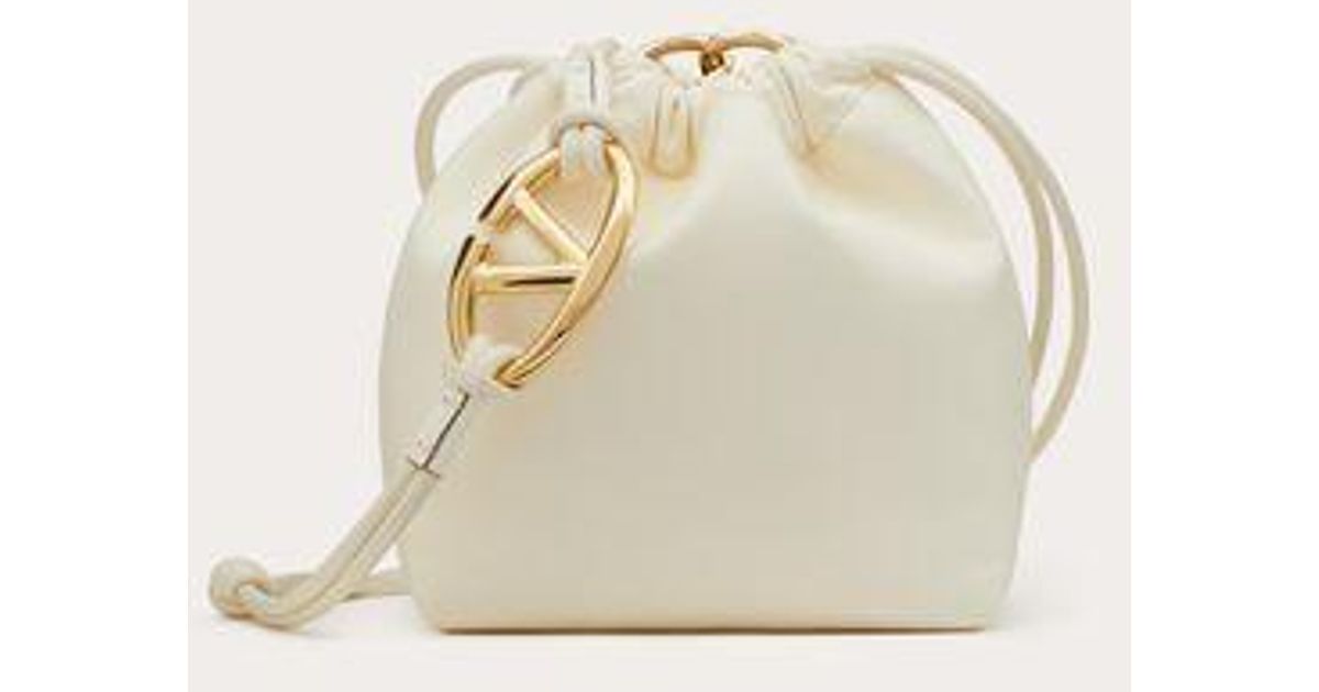 Valentino Garavani Vlogo Pouf Nappa Leather Mini Bucket Bag in Natural | Lyst