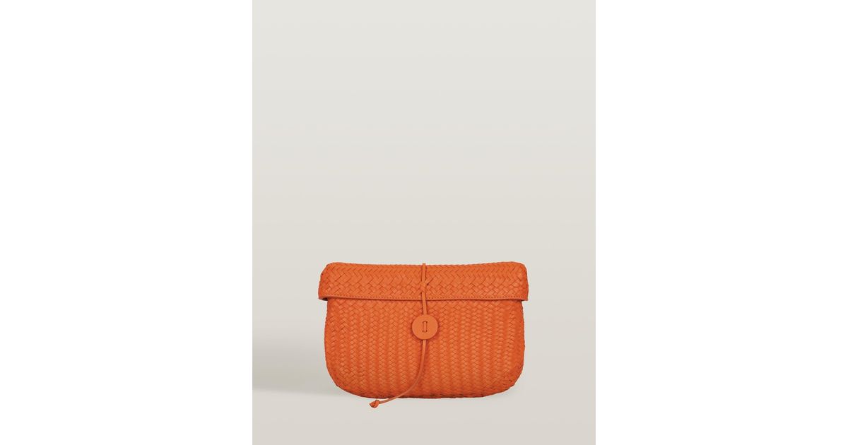 Varana Leather Clutch Bag in Orange - Lyst
