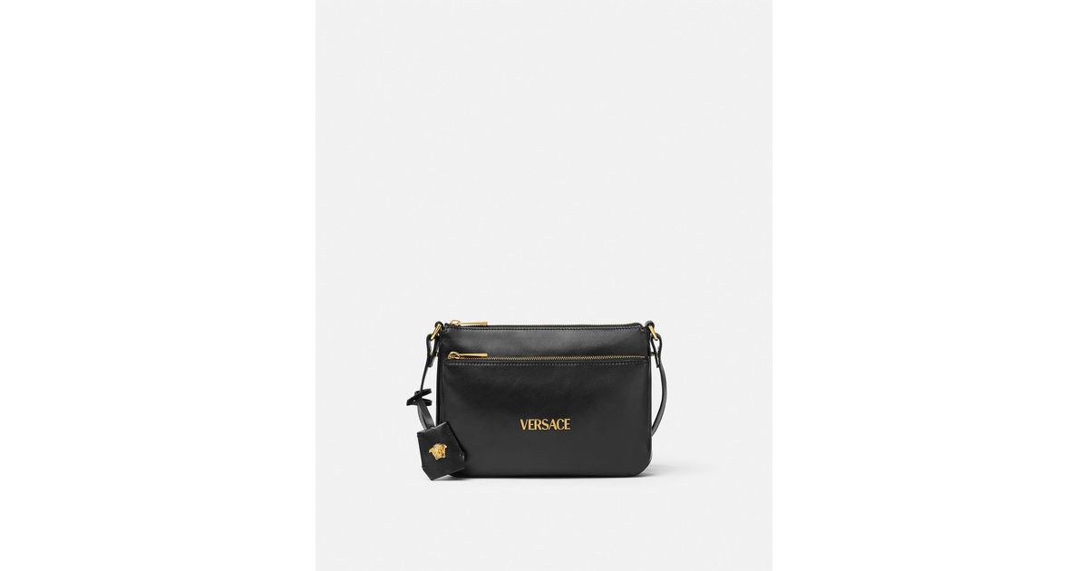 Versace Tag Crossbody Bag in Black | Lyst