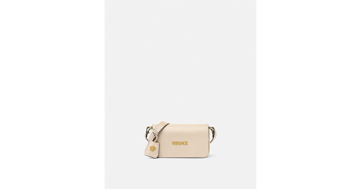 Versace Tag Nappa Mini Bag in Natural | Lyst UK