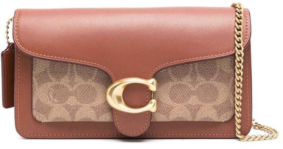 COACH Neutral Clutch Bags in Pink | Lyst