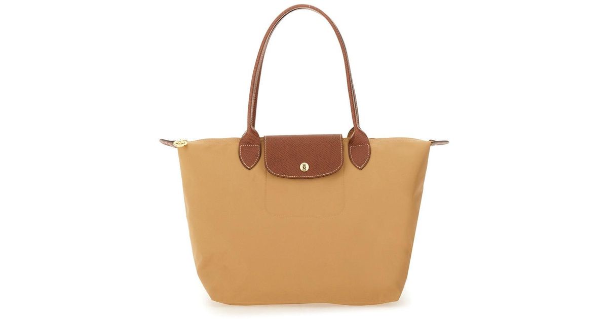 Longchamp Le Pliage Bag in White | Lyst