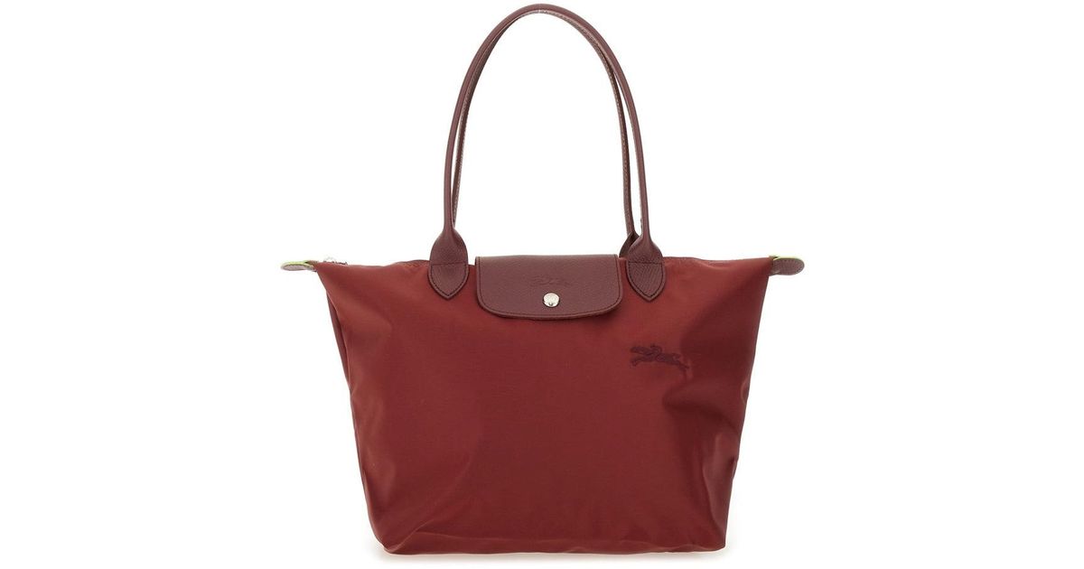 Longchamp "Le Pliage" Bag in Red | Lyst UK