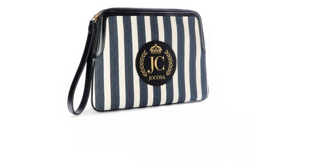 Jocosa Stripe Clutch Bag in Black | Lyst UK