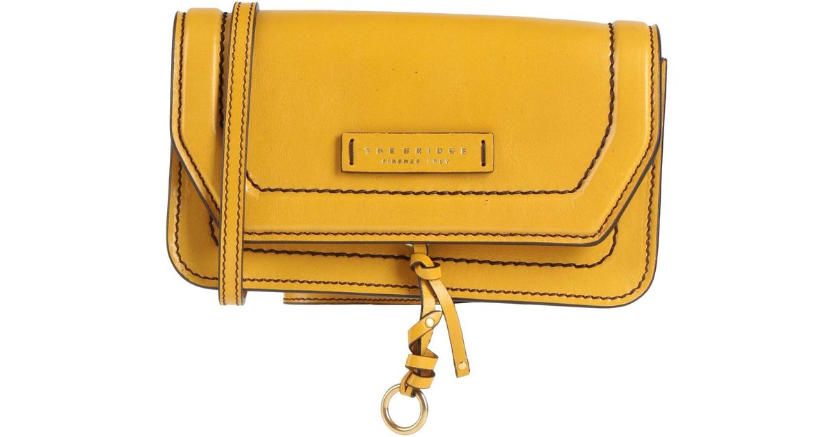 The Bridge Cross-Body Bag in Yellow | Lyst UK