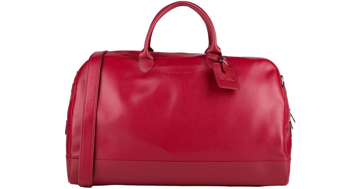 Longchamp Duffel Bags Leather in Red for Men | Lyst UK