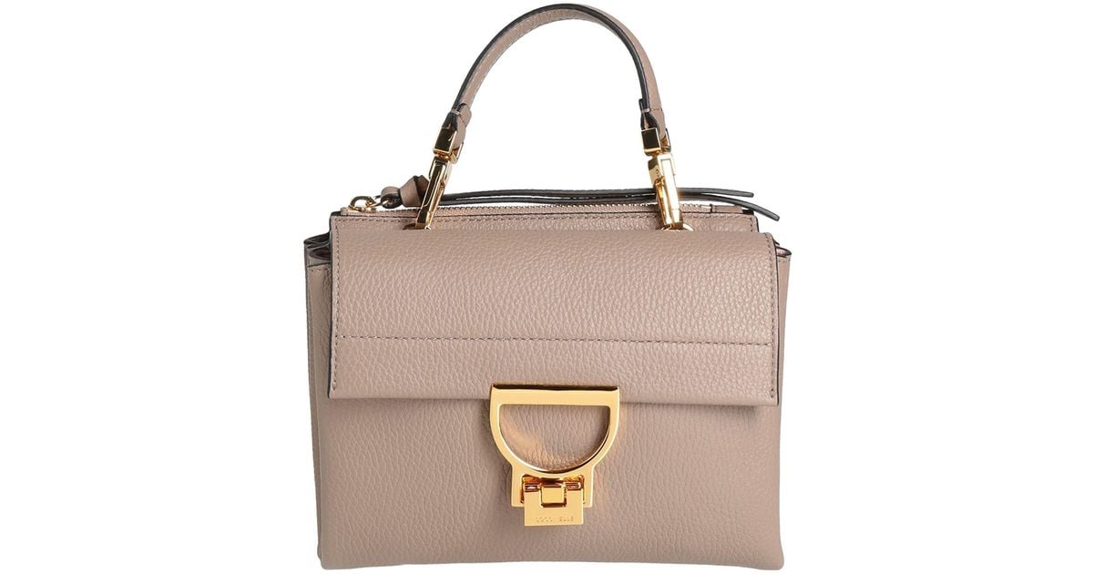 Coccinelle Handbag in Natural | Lyst UK