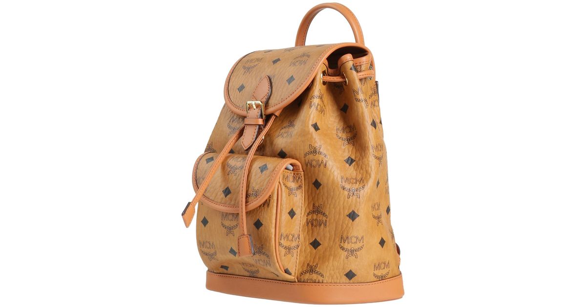 MCM Backpack Leather in Brown | Lyst