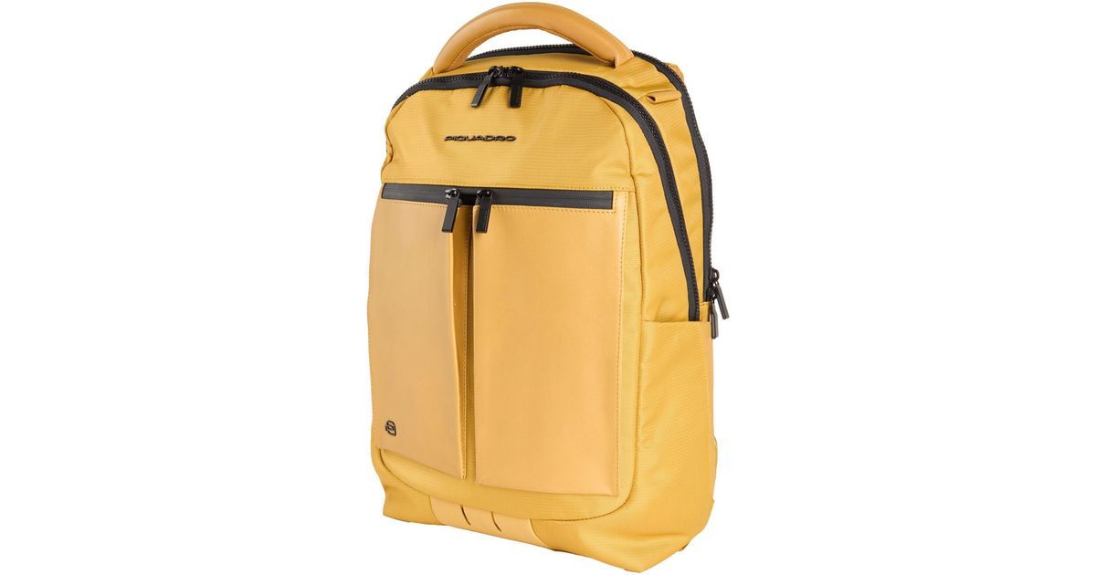 Piquadro Backpacks in Yellow for Men | Lyst