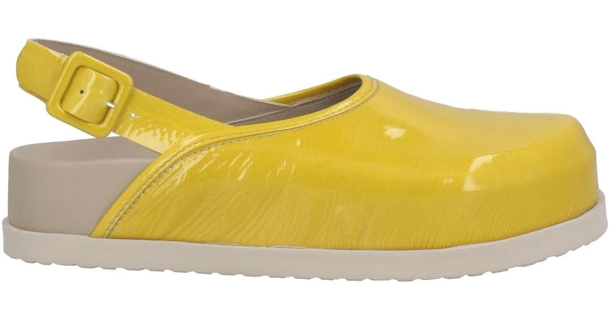 Patrizia Bonfanti Mules & Clogs in Yellow | Lyst