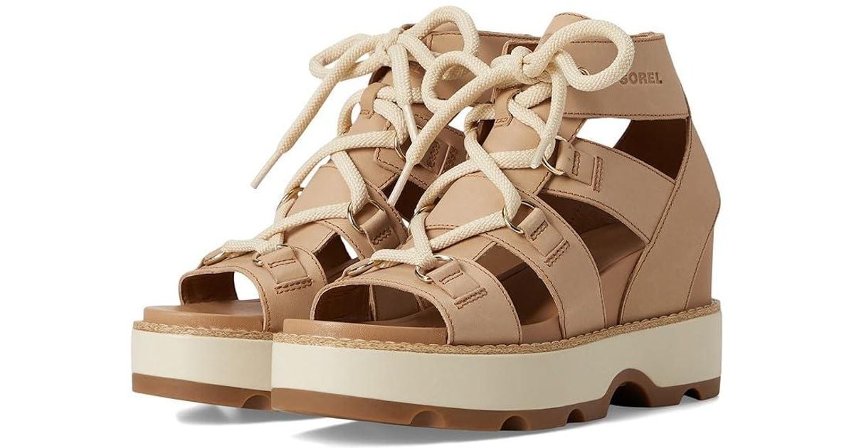 Sorel Joanie Iv Lace Wedge Sandals Honest, Gum 8 B in Metallic | Lyst