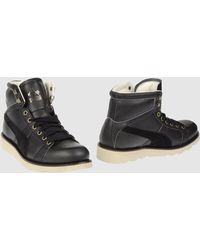 PUMA Boots for Men - Up to 17% off at Lyst.com