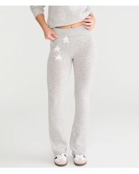 Aéropostale Lace Bow Cozy Sweater Flare Leg Pants in Pink | Lyst