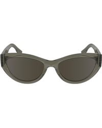Lacoste L6013s N 210 Transparent Brown 54/18/140 Sunglasses in Black ...