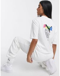PUMA Tops for Women - Up to 62% off at Lyst.com