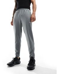 Nike Training Challenger Joggers in Black for Men | Lyst UK