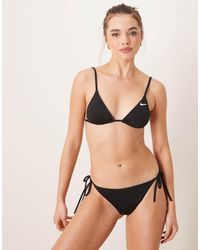 Nike Nike Essential String Bikini Bottom in Natural | Lyst UK