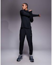 Nike Training Challenger Joggers in Black for Men | Lyst UK