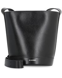 Jil Sander Cannolo Logo-Lettering Bucket Bag in Black | Lyst UK