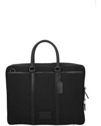 COACH Holdalls and weekend bags for Men - Lyst.com