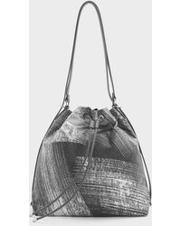 Charles & Keith Bobbie Studded Convertible Two-way Bucket Bag in Black ...