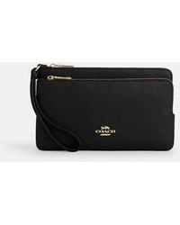 COACH Double Zip Wallet in White | Lyst