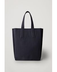 Men's COS Tote bags from $89 | Lyst
