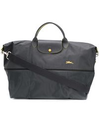 Longchamp Luggage and suitcases for Women - Up to 42% off at Lyst.com