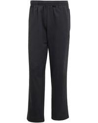 adidas Triple-Stripe Logo Trousers in Green for Men | Lyst UK