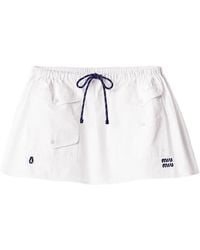 Miu Miu Front Logo Pockets Skirt in Red | Lyst UK