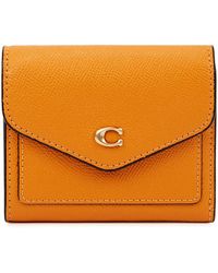 Yellow COACH Wallets and cardholders for Women | Lyst