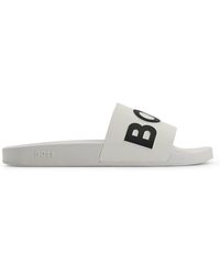 BOSS Bay Logo Sliders, Branding Strap Sandals in Blue for Men | Lyst UK