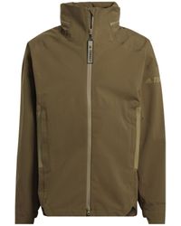 adidas Utilitas Waterproof Jacket in Blue for Men | Lyst UK