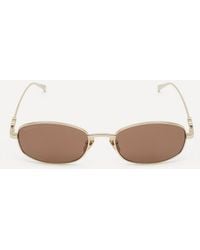 Gucci Oval Logo Sunglasses in Brown | Lyst UK