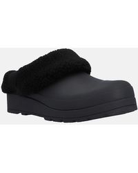 HUNTER Play Mini Print Clogs in Black | Lyst UK