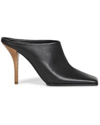 Alaïa Heeled Mules in Red | Lyst