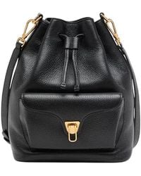 Coccinelle Bags in Purple | Lyst