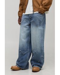 BoohooMAN Elasticated Super Baggy Side Panel Piping Jeans in Blue for ...
