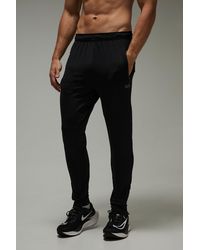 BoohooMAN Active Gym Essentials Stretch Tapered Jogger in Blue for Men ...