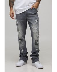 BoohooMAN Super Skinny Stacked Rip & Repair Paint Splatter Jeans in ...