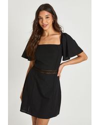 Boohoo Crochet Trim Linen Look Mini Dress in White | Lyst UK