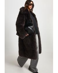 Boohoo Shaggy Fur Short Coat With Clasps in Natural | Lyst UK